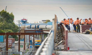 Australian first rail straddle carrier completes operation