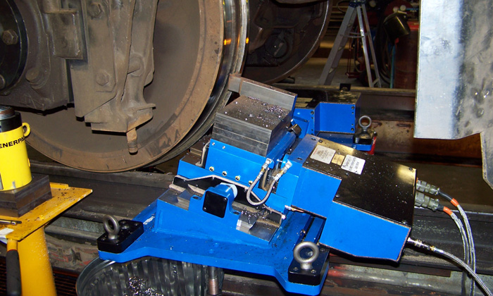 Simplifying portable precision wheel truing